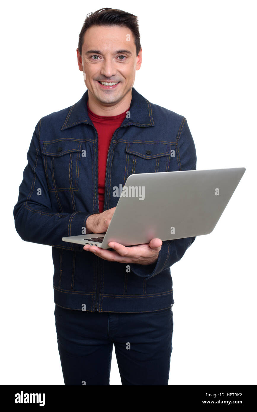 Portrait of smiling young man with laptop isolated over white ...