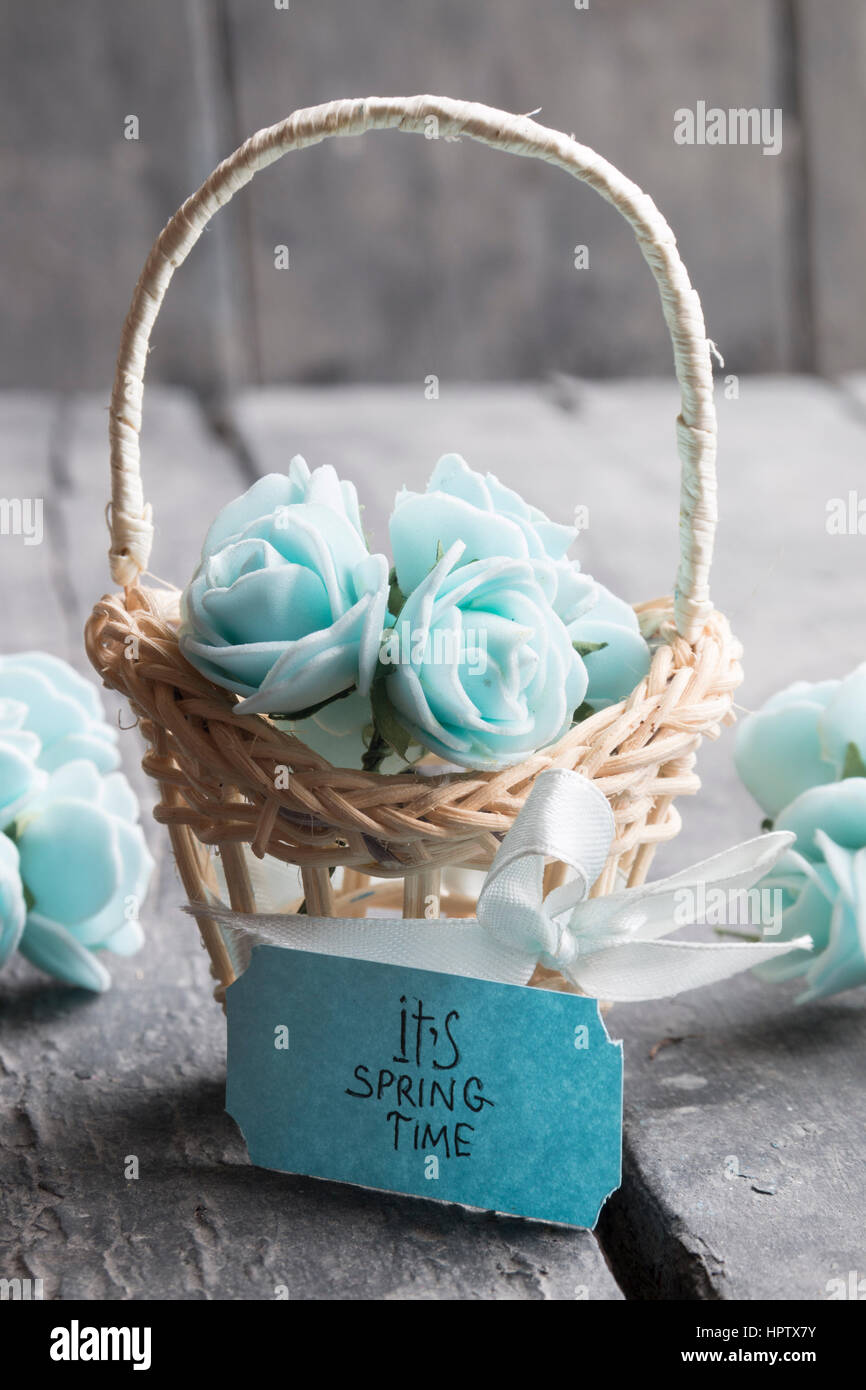 Bouquet of spring flowers in basket. Its spring Time tag Stock Photo ...