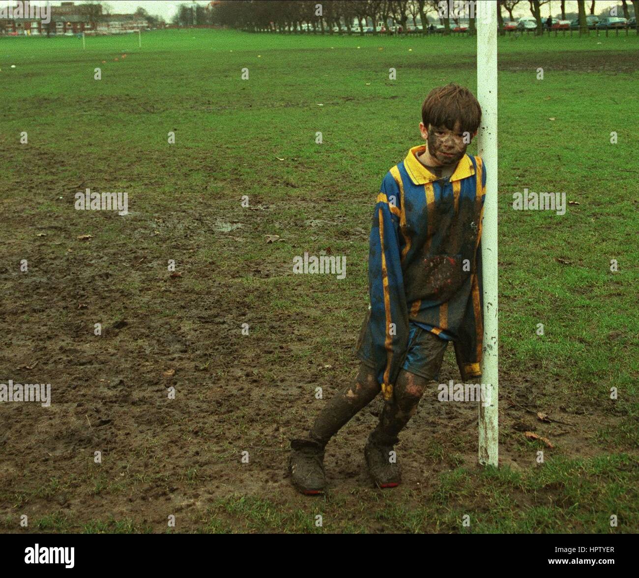 MUDDY SCHOOLBOY LEANS YORK NORTH YORKSHIRE ENGLAND LEANS AGAINST ...