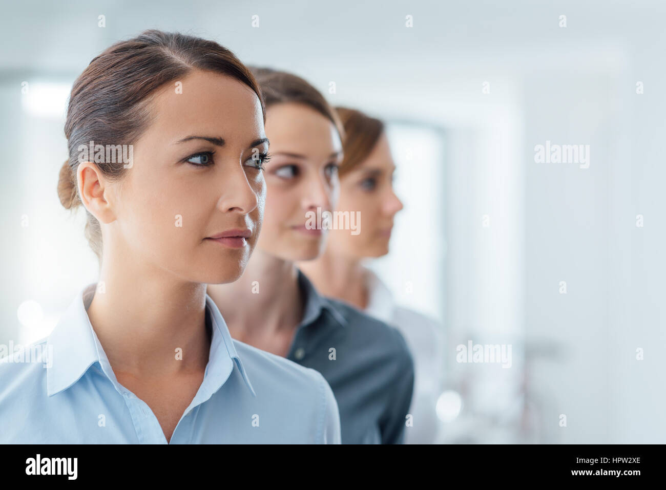 Ambitious business women posing and looking away, leadership and women ...
