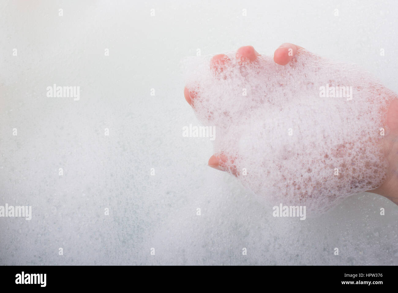 Hand washing and soap foam on a foamy background Stock Photo - Alamy