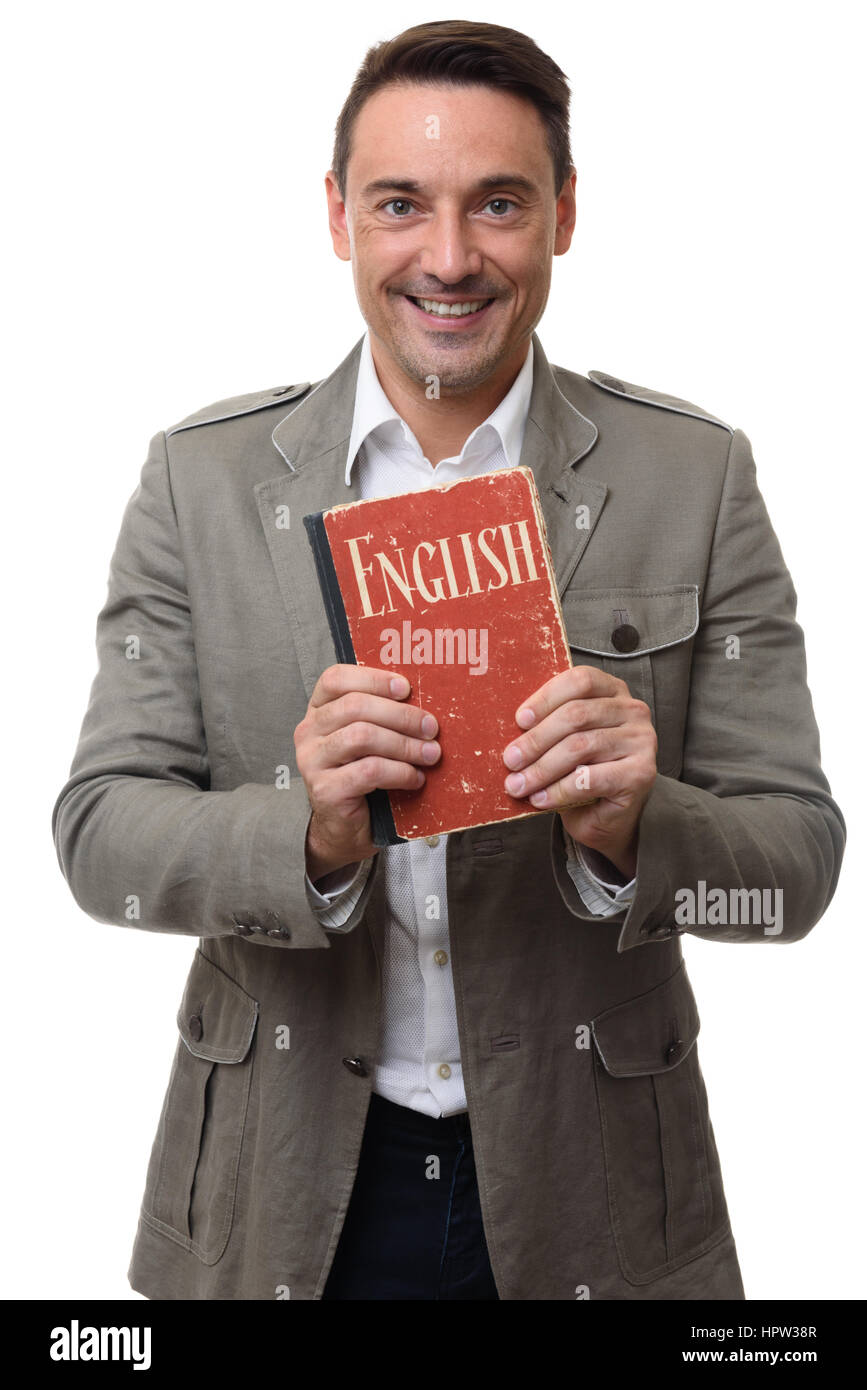 smiling handsome man holds English textbook. Isolated on white ...