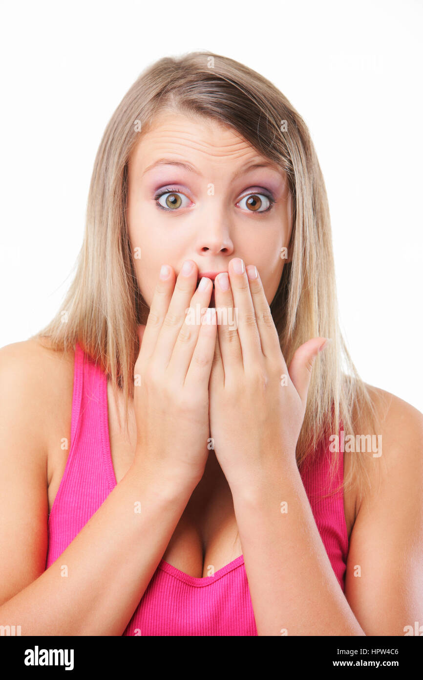 Close up portrait of a shocked girl on white background Stock Photo - Alamy