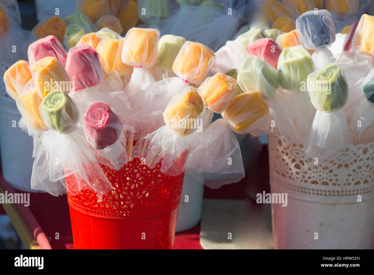 Collection of bars of colorful soup in the shape of rose Stock Photo ...