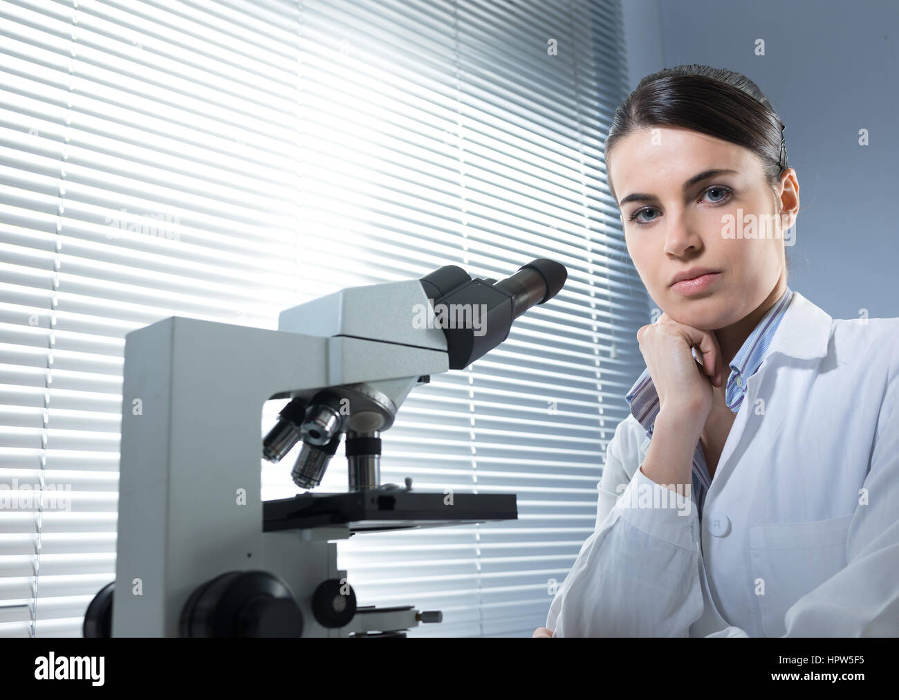 Young female researcher working in the chemistry laboratory Stock Photo ...