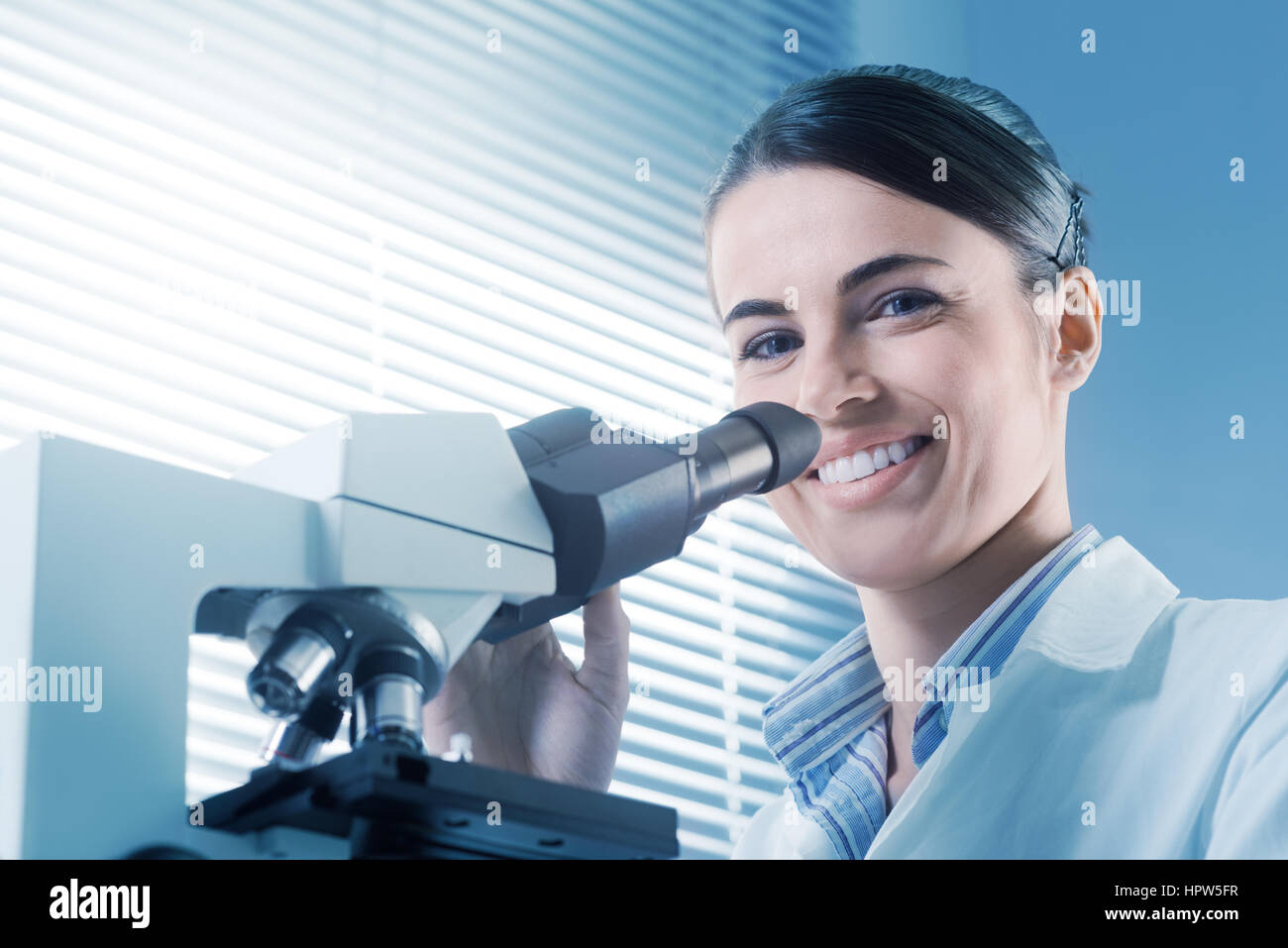 Happy female student chemistry hi-res stock photography and images - Alamy