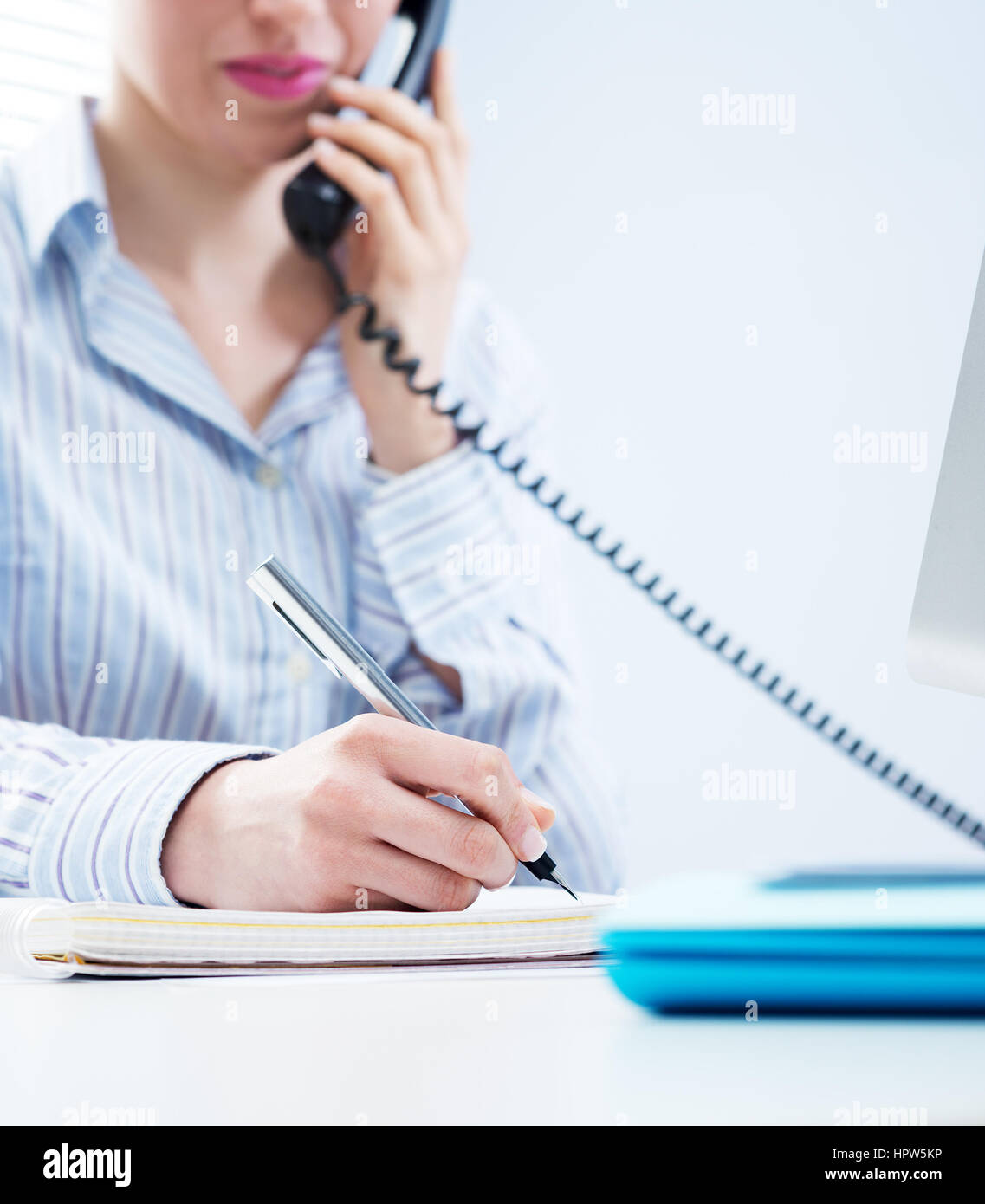 Phone call writing paperwork hi-res stock photography and images - Alamy