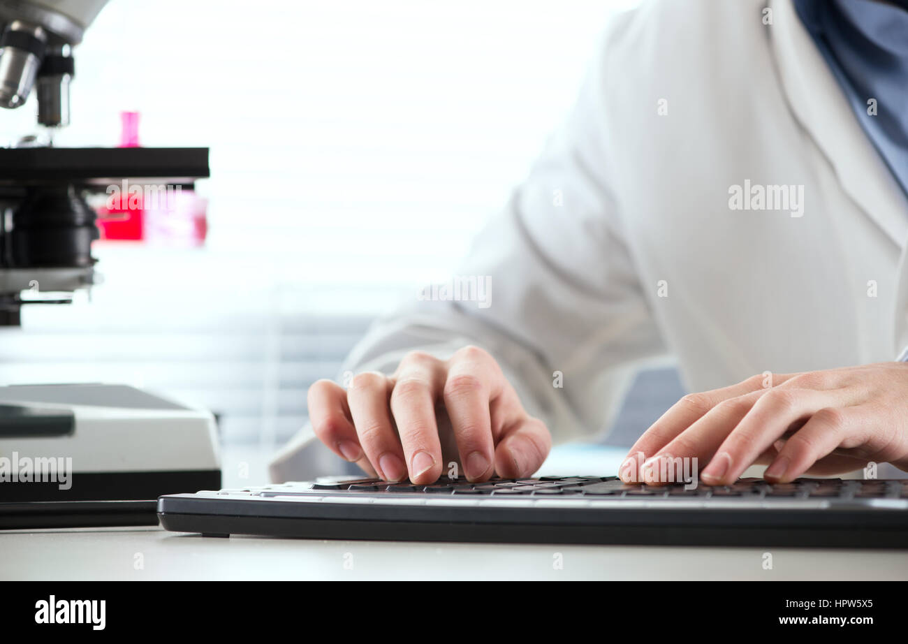 Researcher working desk typing hi-res stock photography and images - Alamy