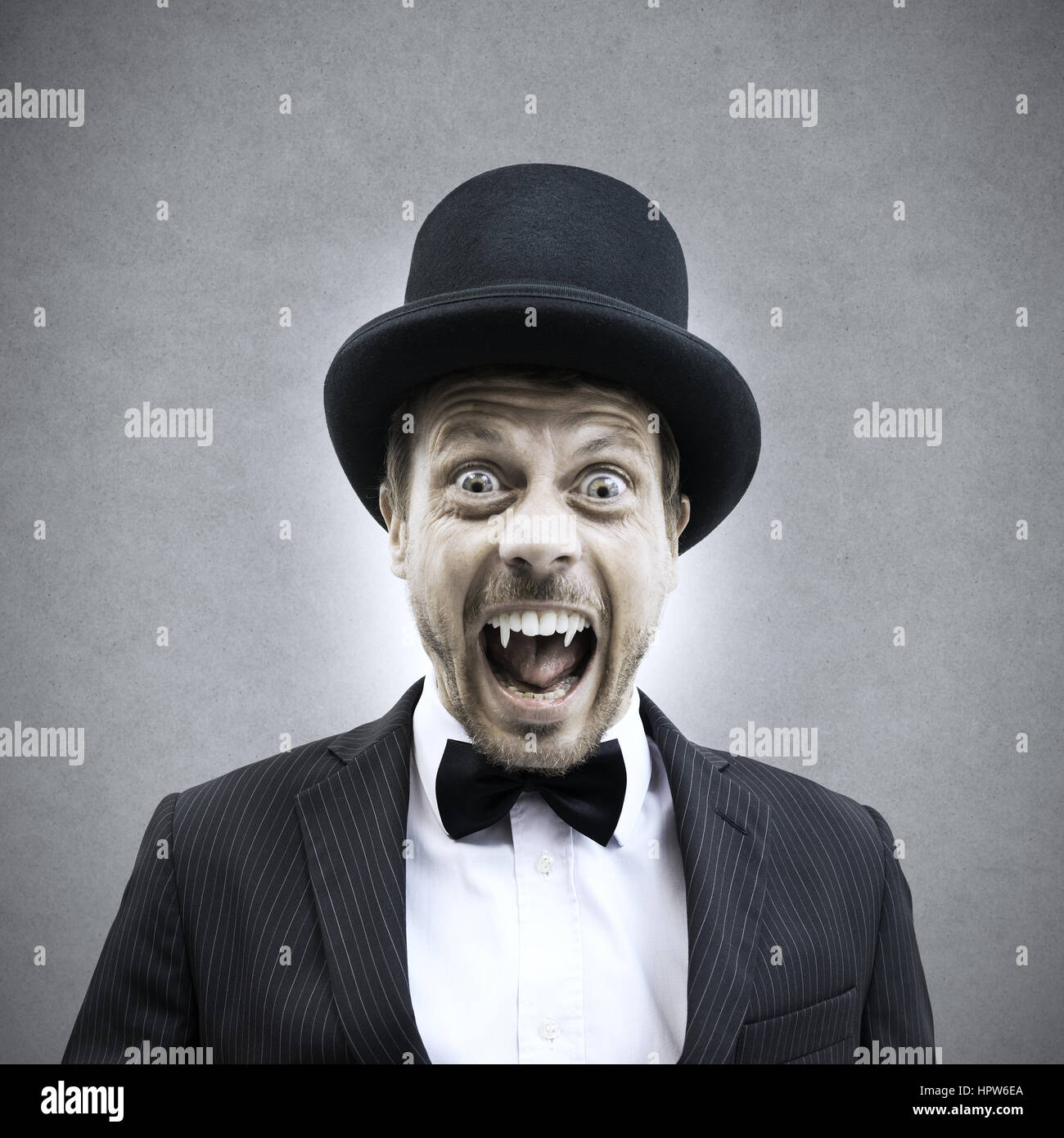 Scary vampire businessman screaming and showing fangs in vintage ...