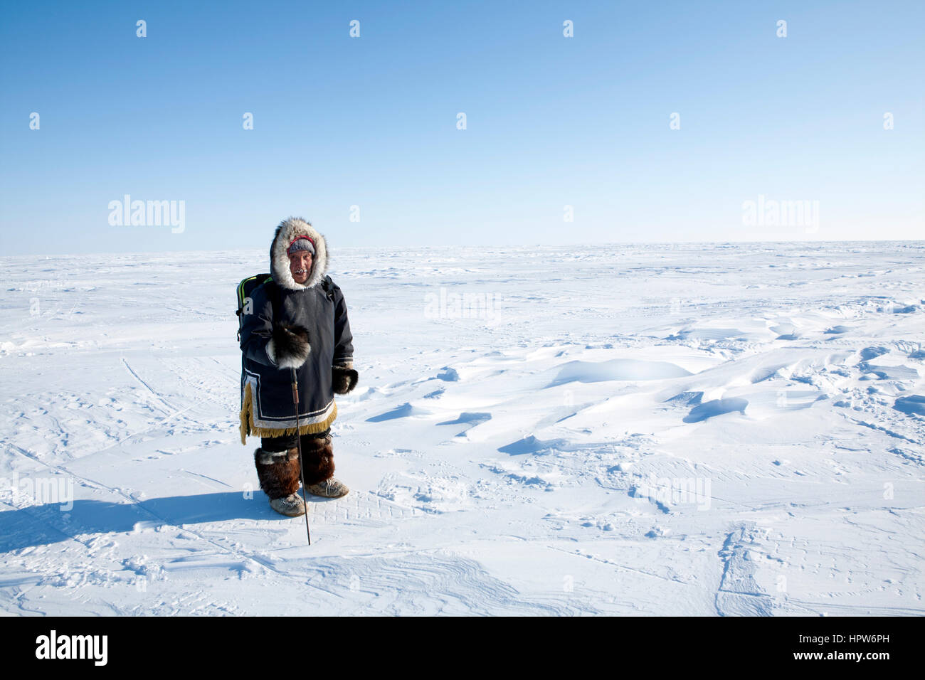 Inuits are hunting on the northpole Stock Photo - Alamy