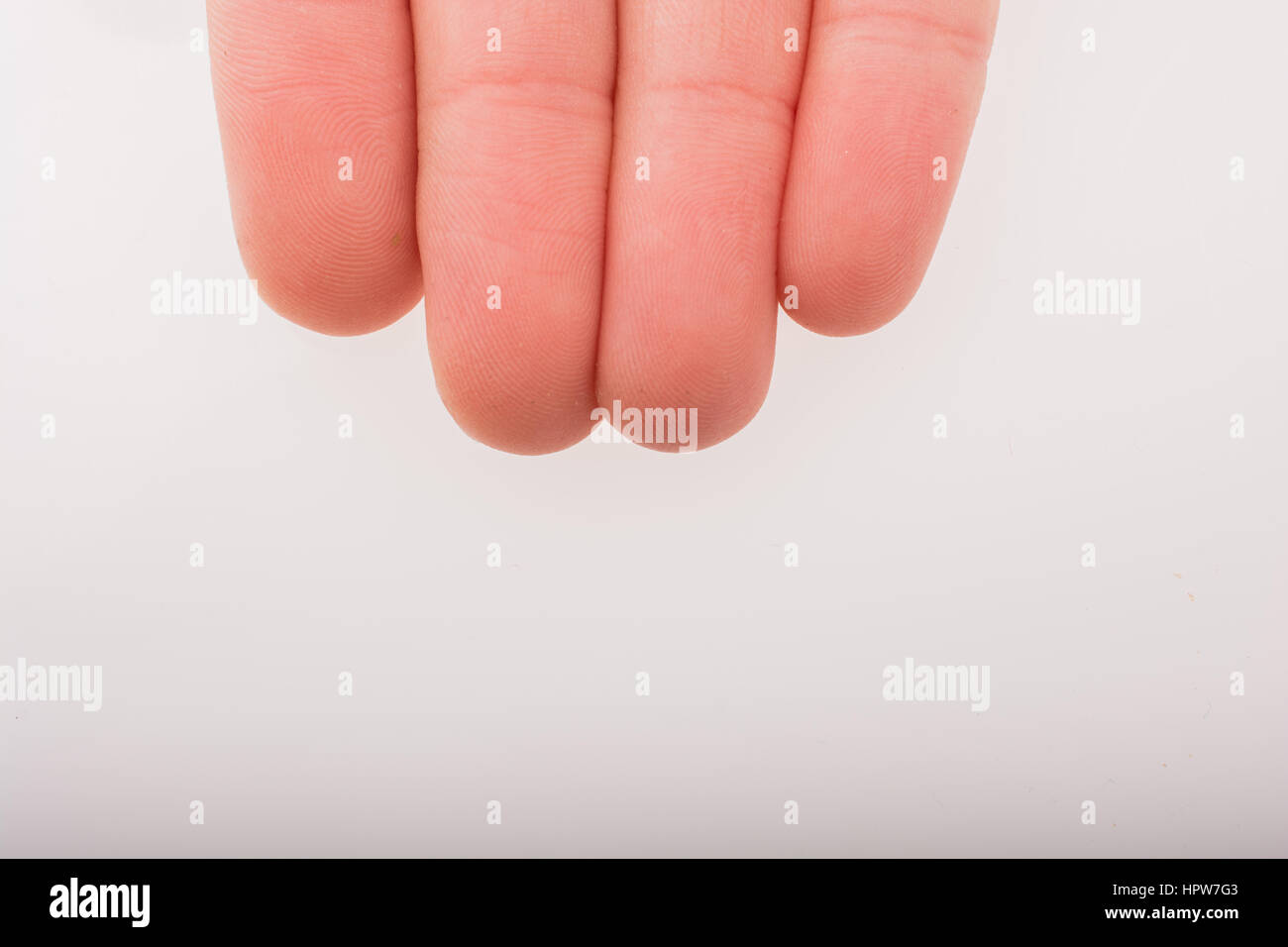 Four fingers of a child hand partly seen in view Stock Photo - Alamy