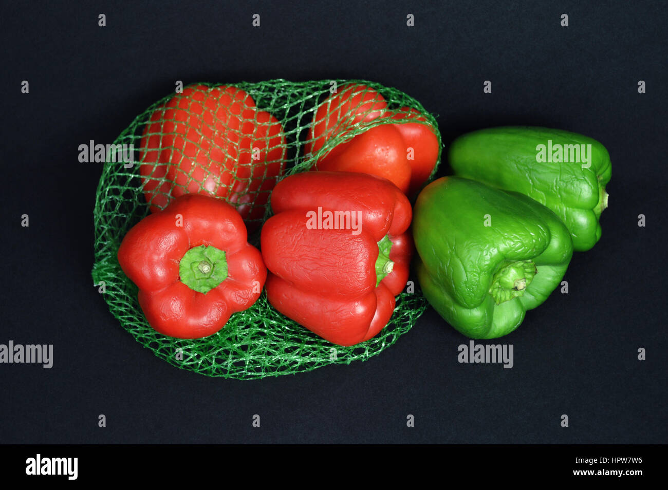 A pepper assortment in a net Stock Photo - Alamy