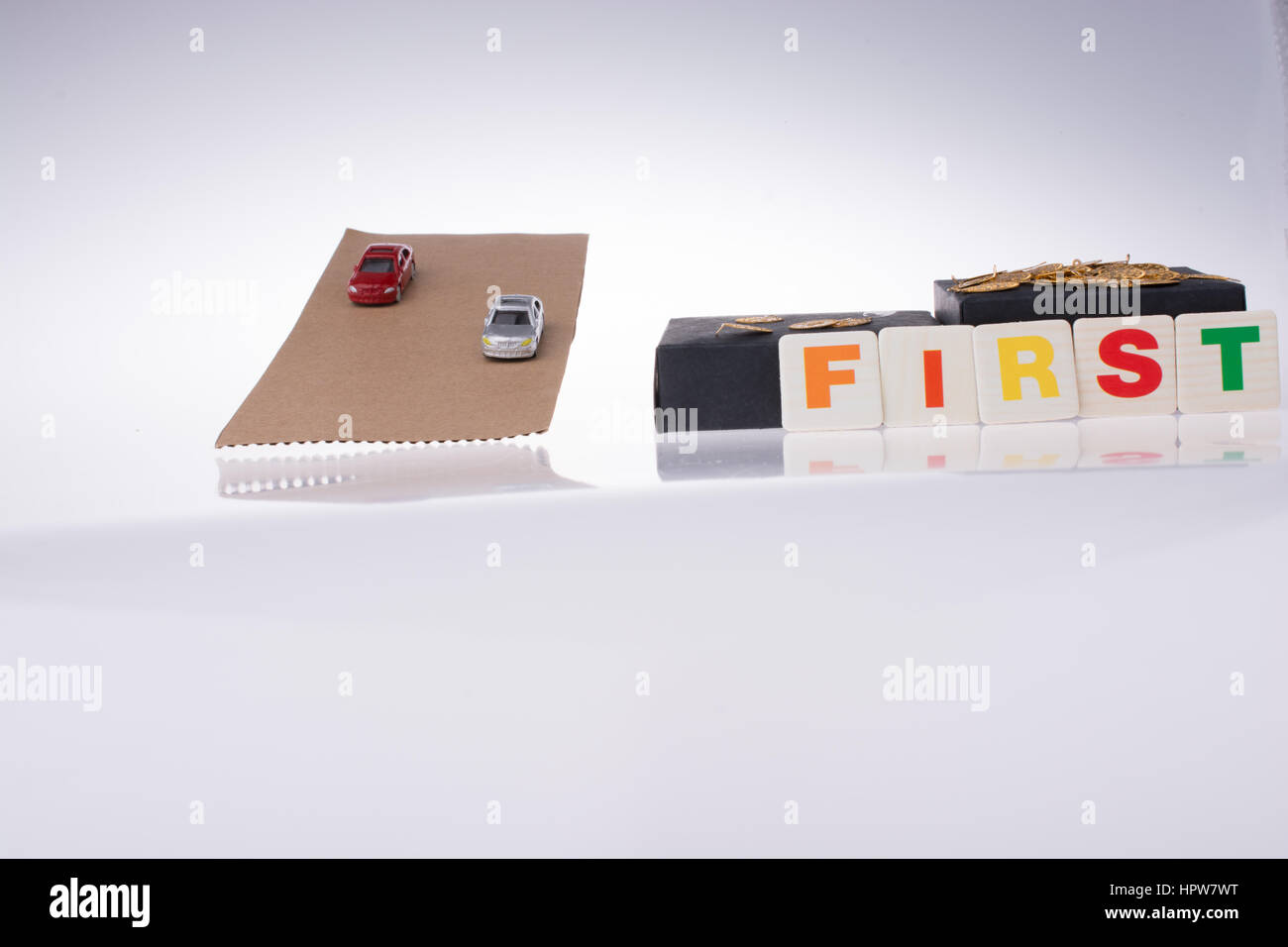 Colorful little toy cars on white background Stock Photo - Alamy