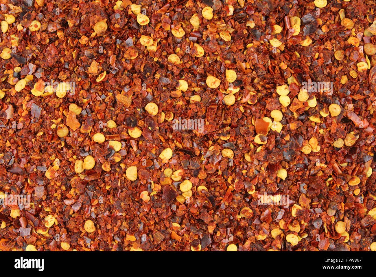 crushed red pepper flakes closeup as a food background texture Stock ...