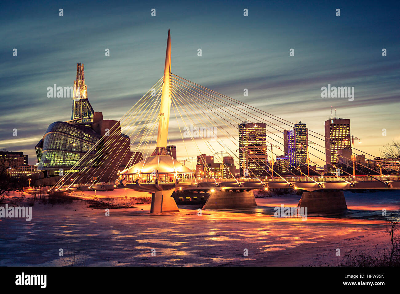 Winnipeg, Illuminated Provencher Bridge over frozen Red river in the ...