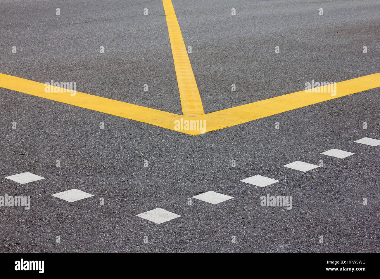 Asphalt road texture background with yellow line Stock Photo - Alamy