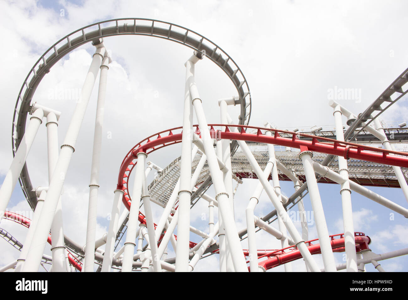 Loops of rollercoaster in fun park on sunny day Stock Photo - Alamy