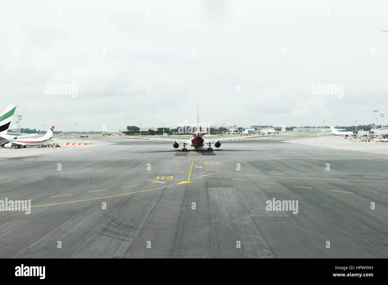 back of passenger plane on runway at airport Stock Photo - Alamy