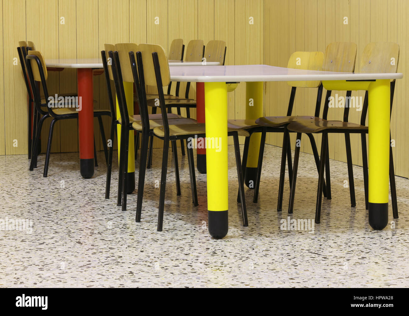 colored benches and seats of a class of a school Stock Photo - Alamy