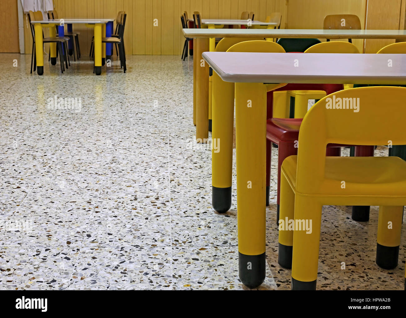colored chairs and the tables in a school classroom Stock Photo - Alamy