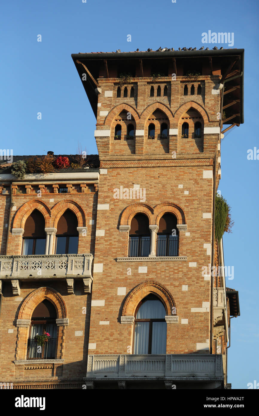 antique brick building with a tower in a European city Stock Photo - Alamy