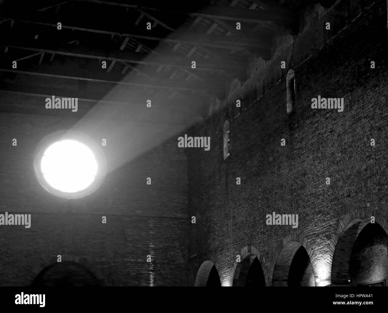 atmospheric beam of light from rose windows that illuminates the ...