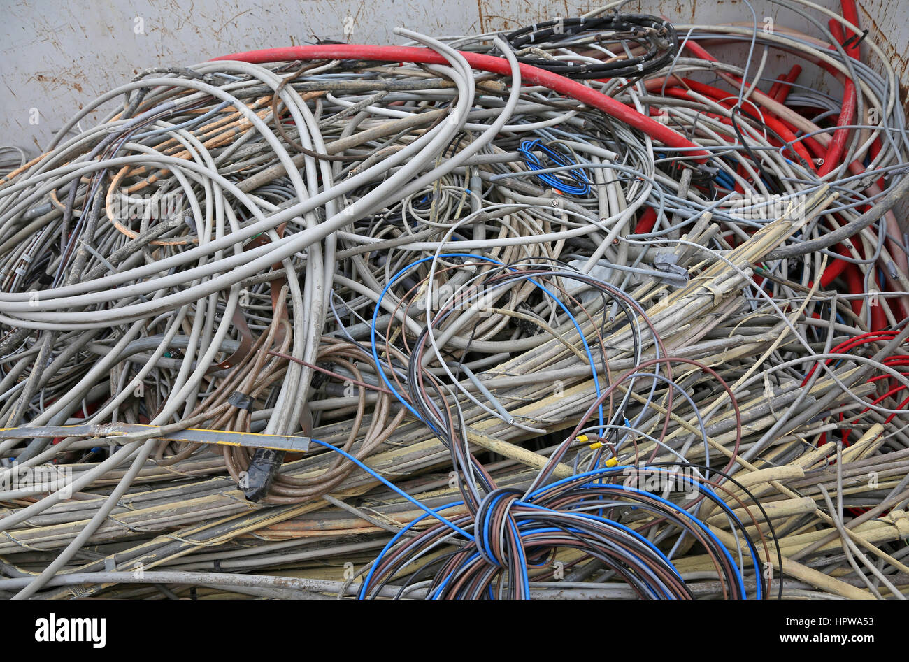 many copper electrical cables in a deposit of waste collection Center ...