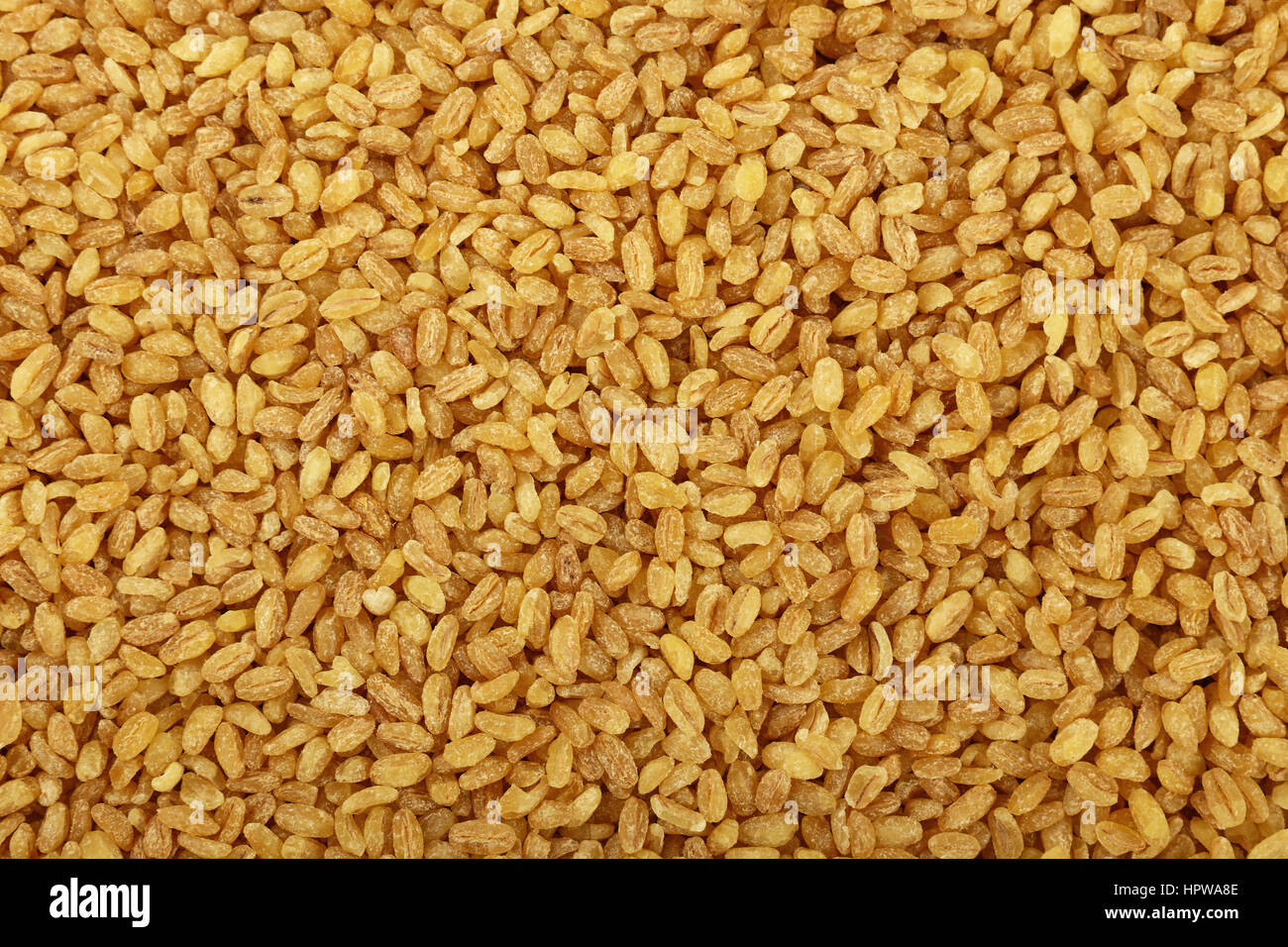 Yellow traditional bulgur (bulghur, burghul) big grains of durum wheat ...