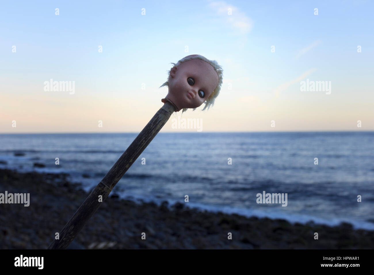 Doll head on coast hi-res stock photography and images - Alamy