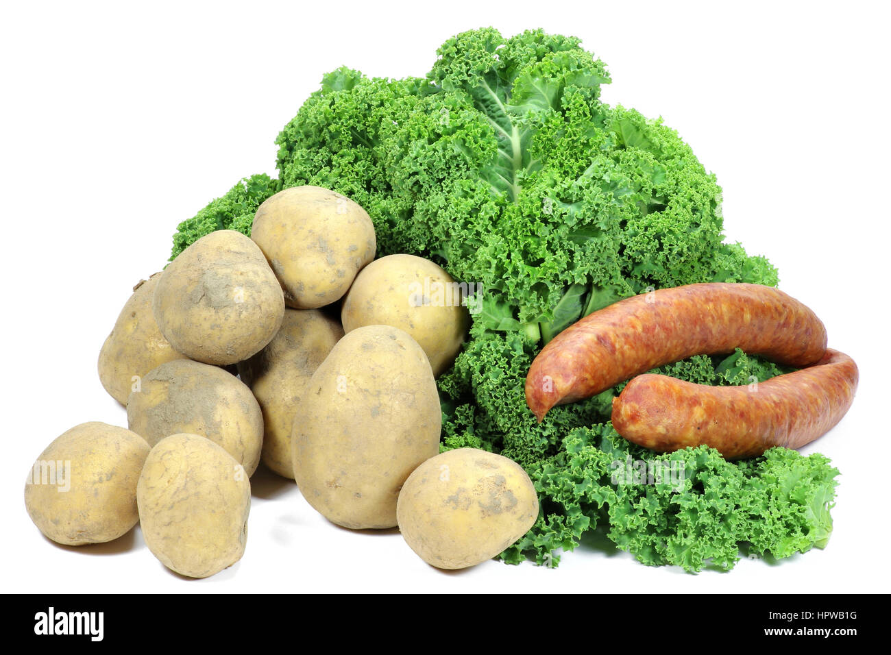 ingredients of a traditional German curly kale meal isolated on white ...