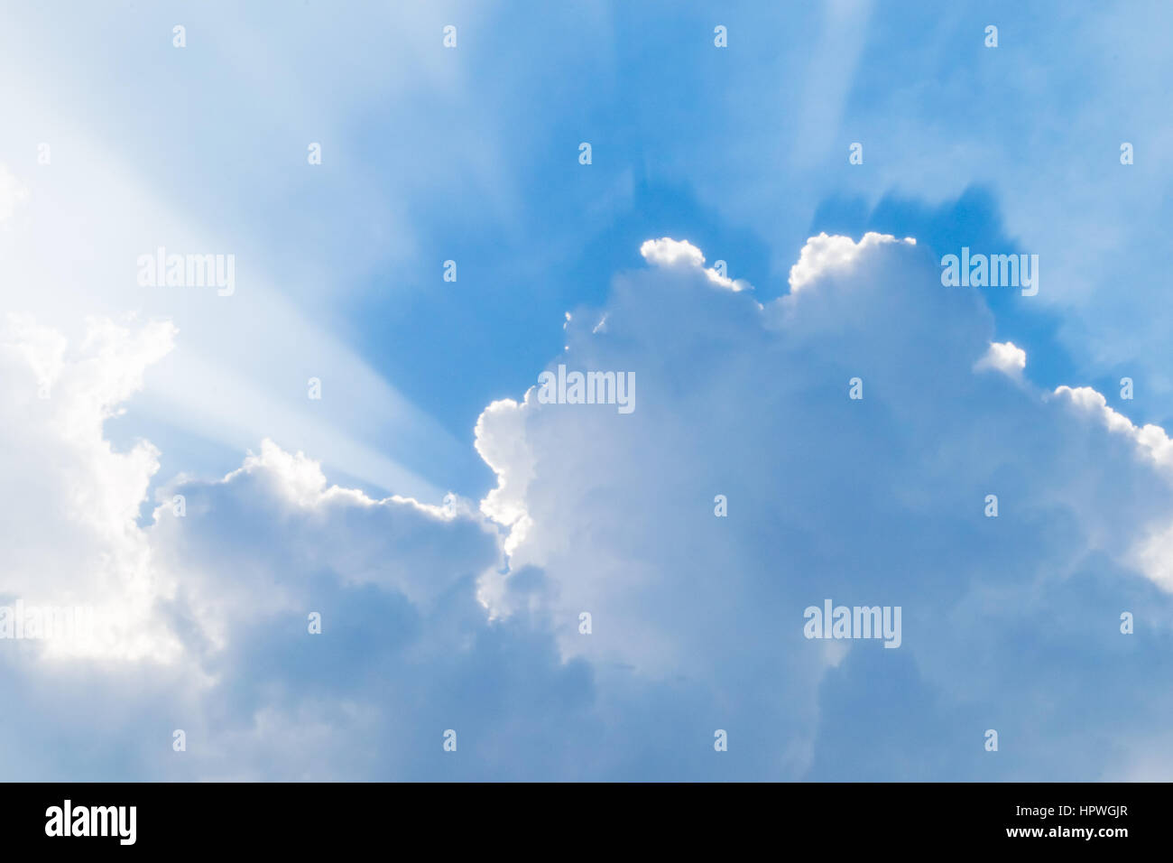Blue sky with isolated white clouds hi-res stock photography and images ...