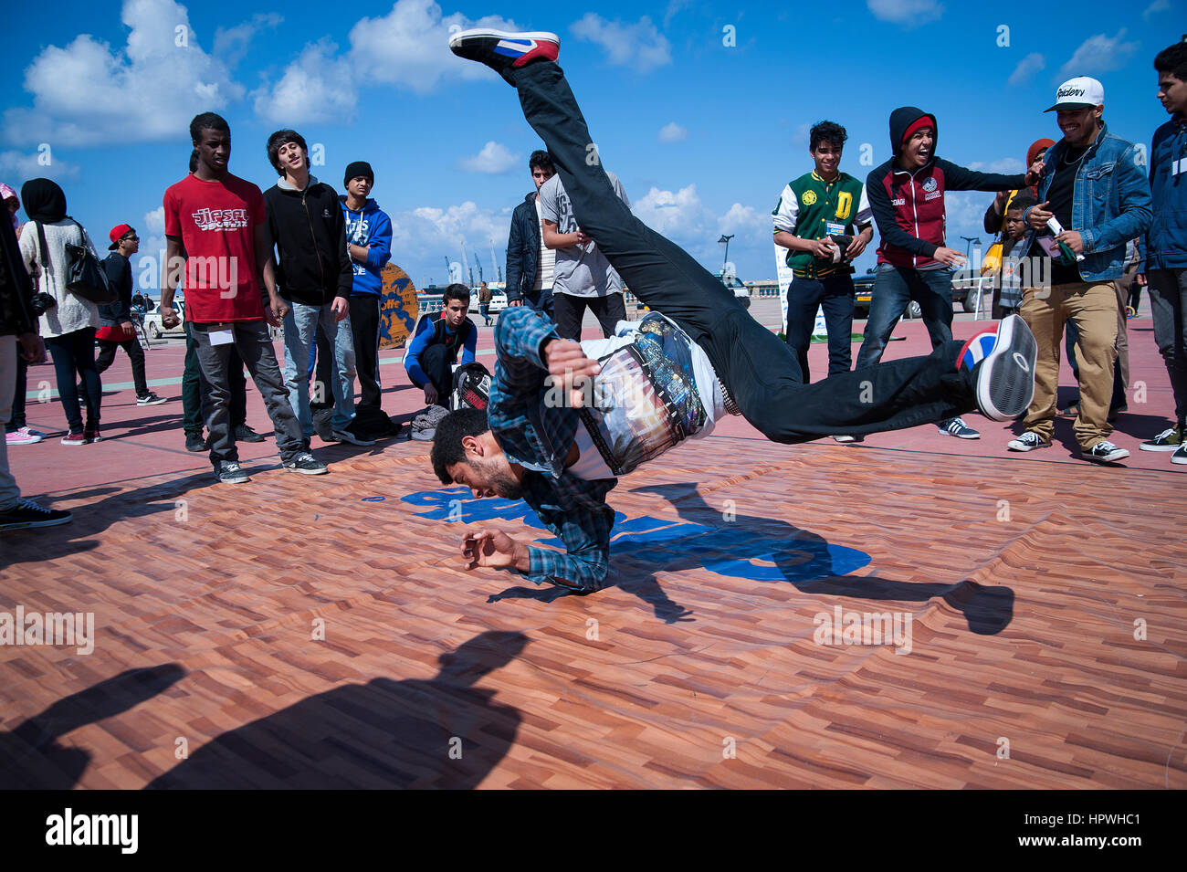 Libya, Tripoli: Young guys breakdance at an open air dance and parkour ...