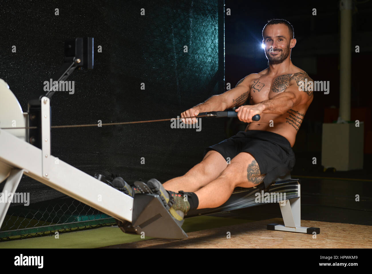 Strong man exercising gym muscular sport hi-res stock photography and ...