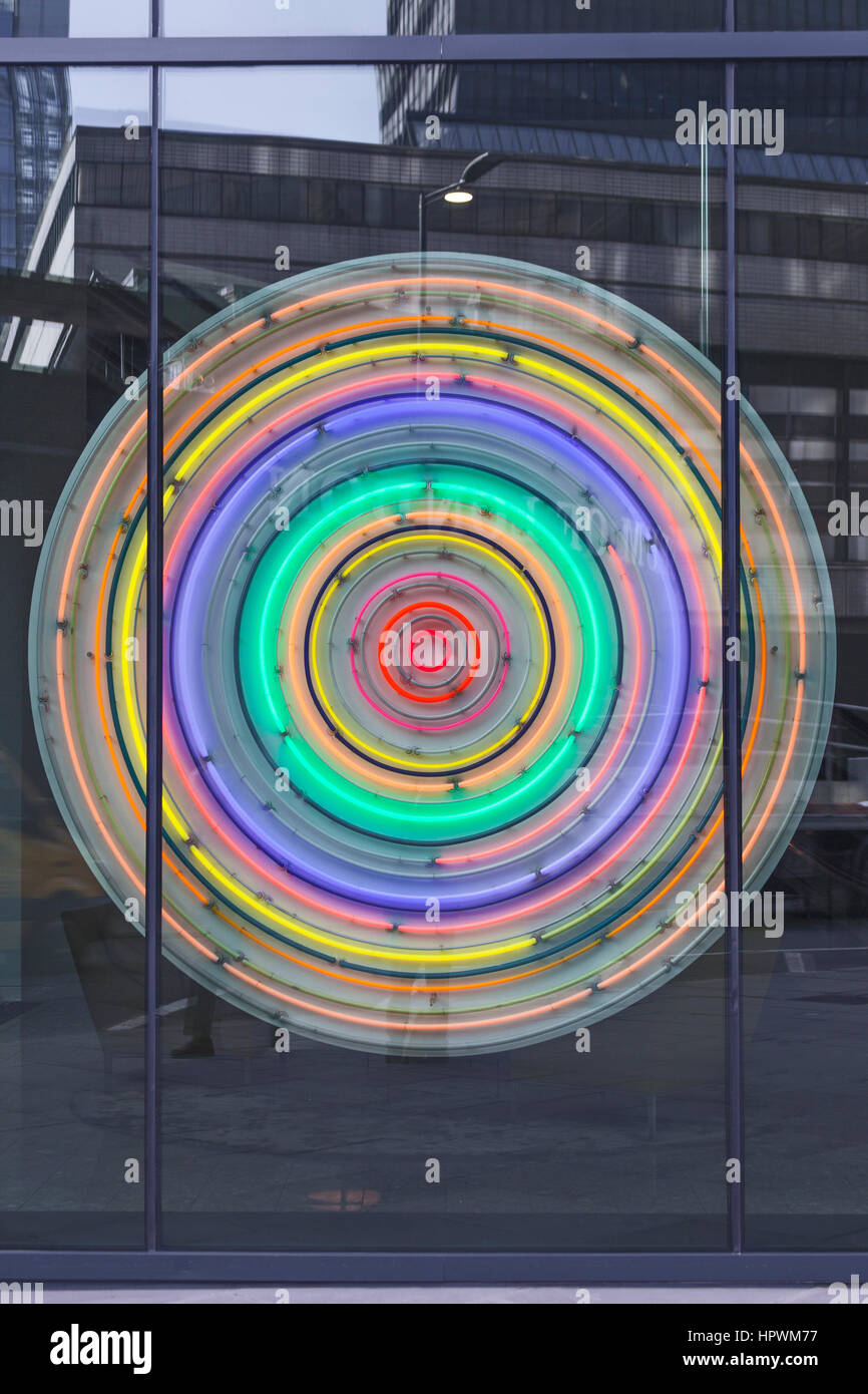 City of London A multi-coloured roundel on a glass office door at the ...