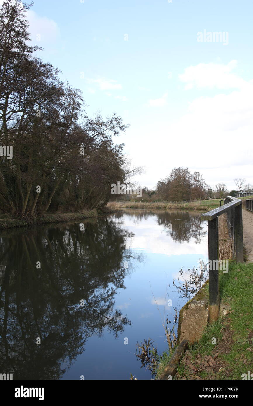 A scenic and peaceful scene on Surrey's River Wey below Guildford with ...