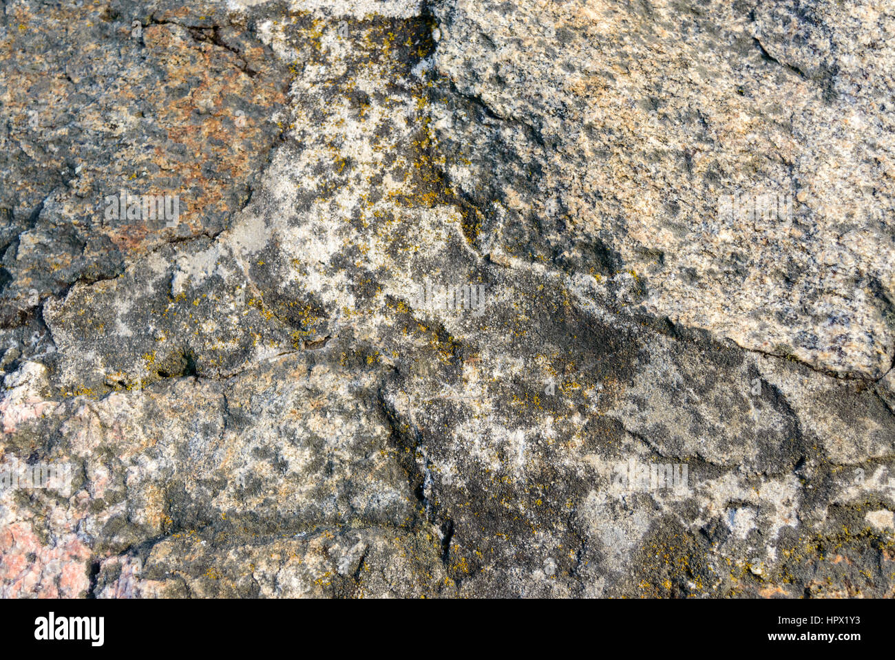 Natural granite rough stone. The old surface close up. Background ...