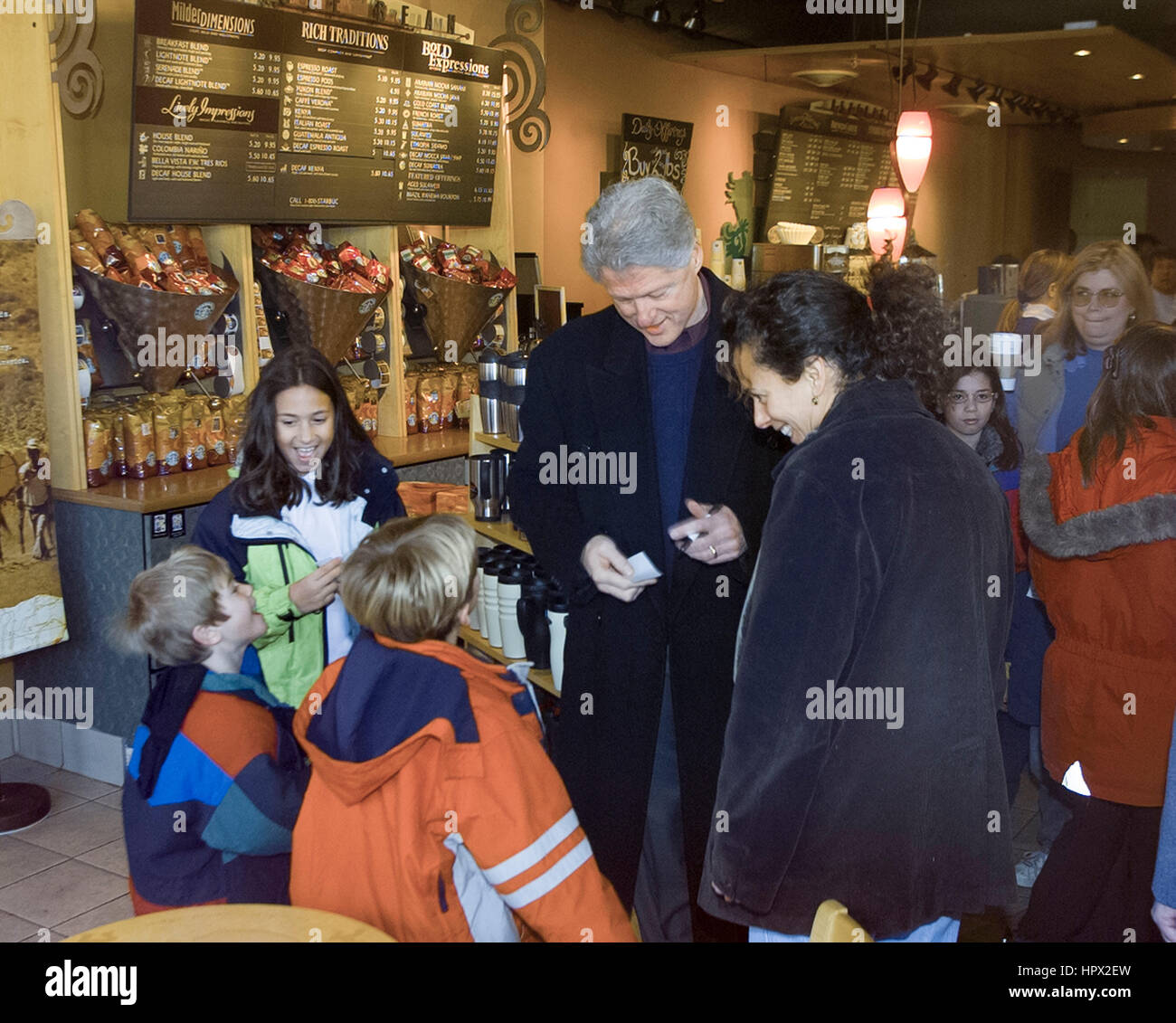 President Bill Clinton with customers at a Starbucks coffee shop in ...