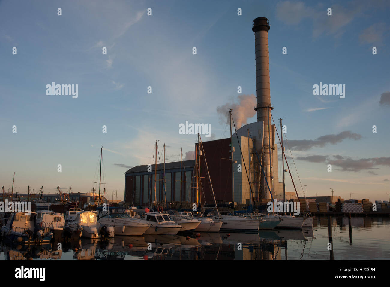 Shoreham power station with vapour rising and boats and boat ...