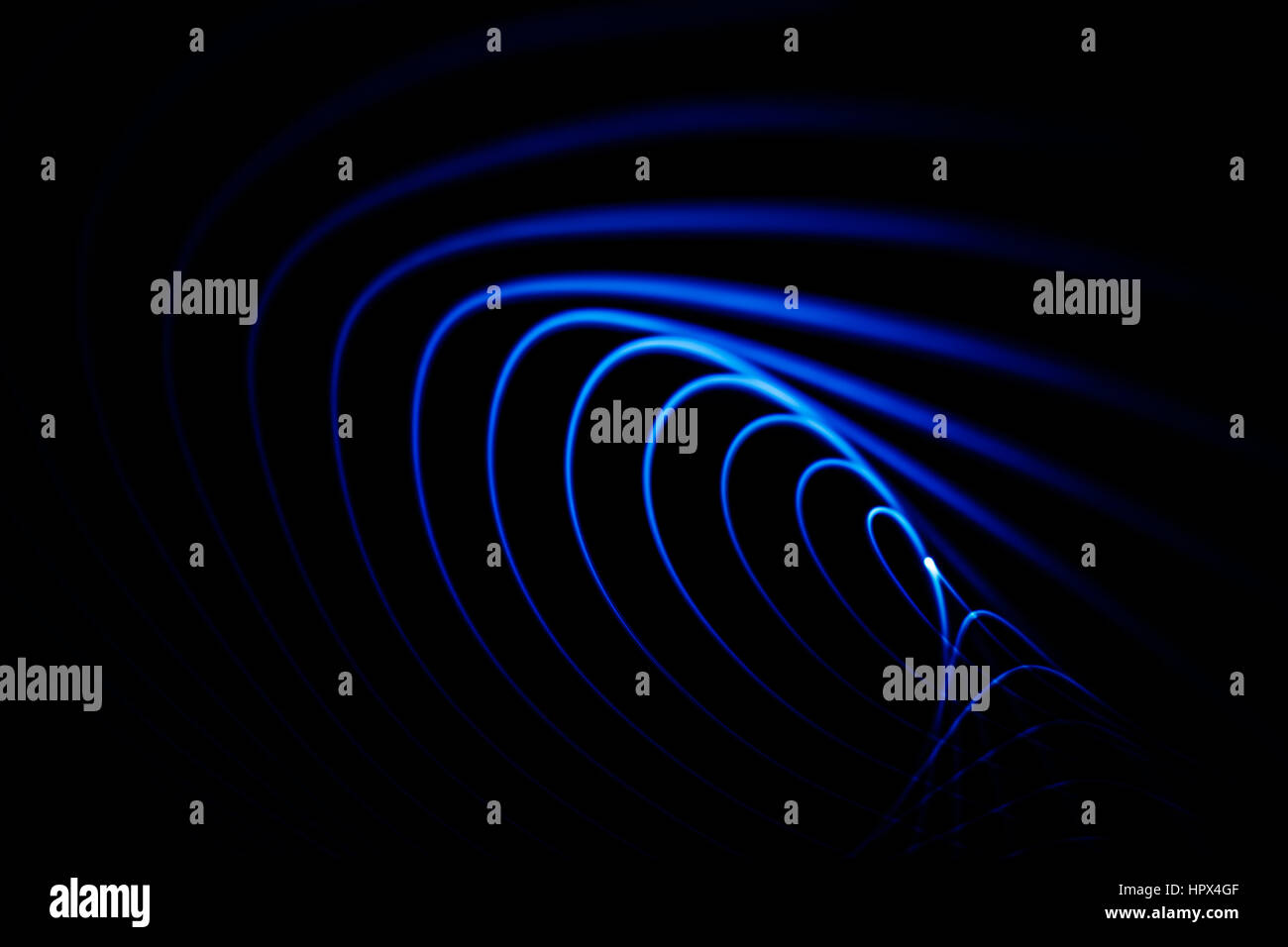 Sound waves in the visible blue color in the dark Stock Photo - Alamy