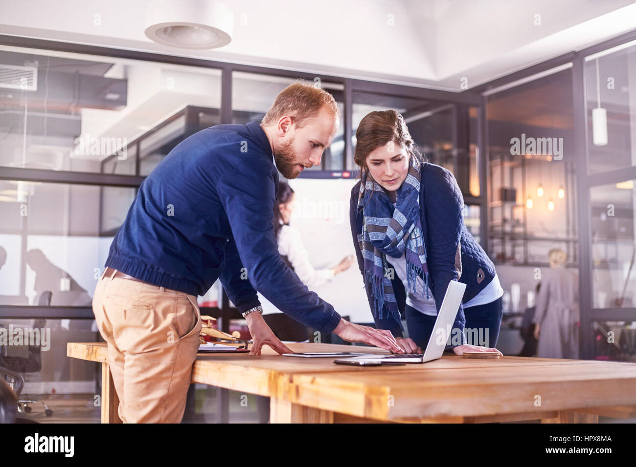 Business people using laptop in conference room meeting Stock Photo - Alamy