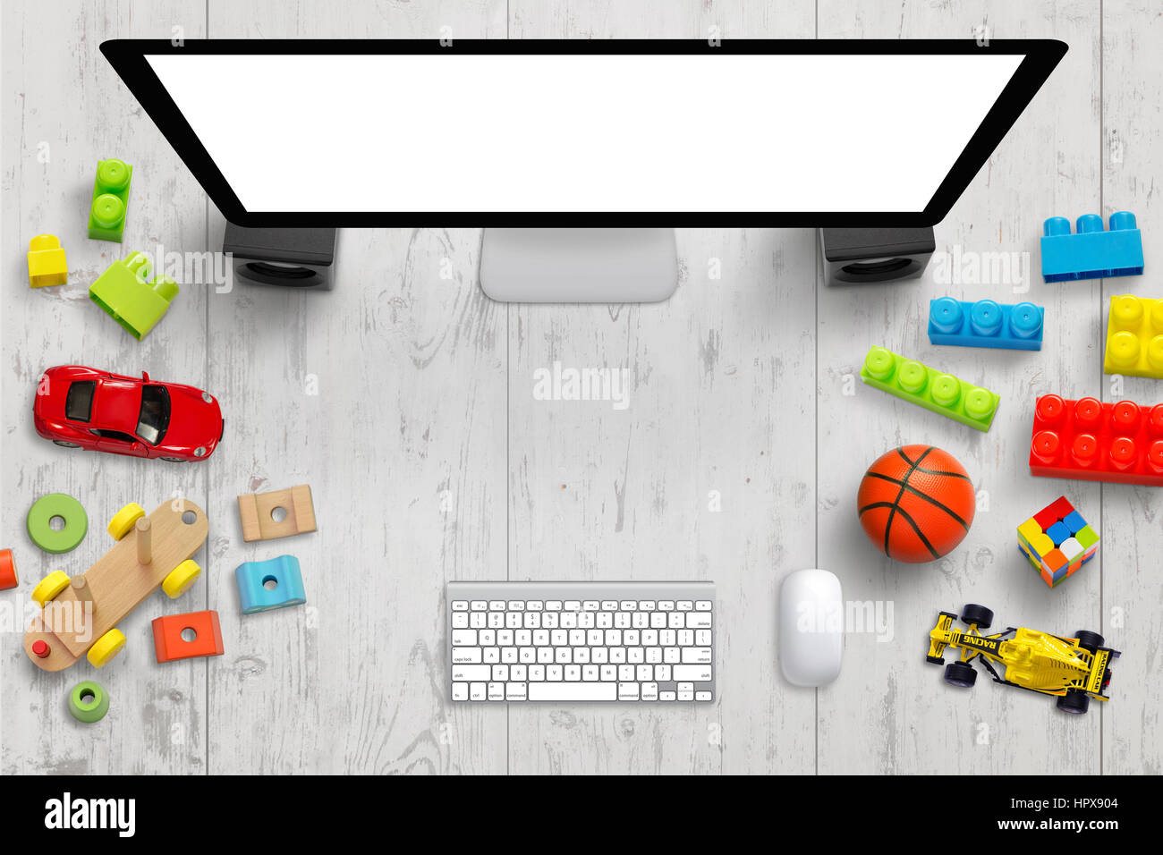 Children work desk with computer and toys. Creative scene with free ...