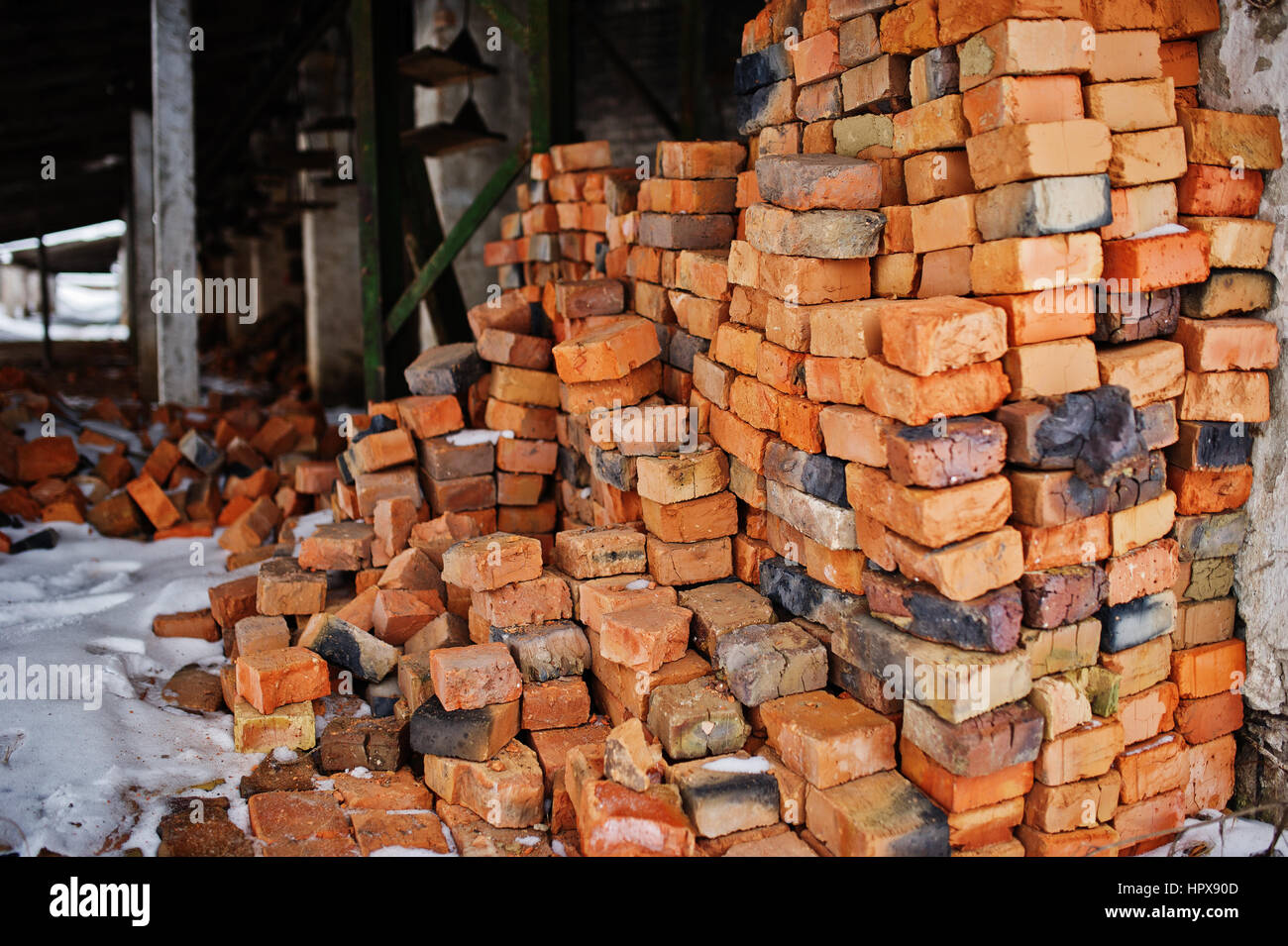 Large pile of old bricks at plant outdoor with snow Stock Photo - Alamy