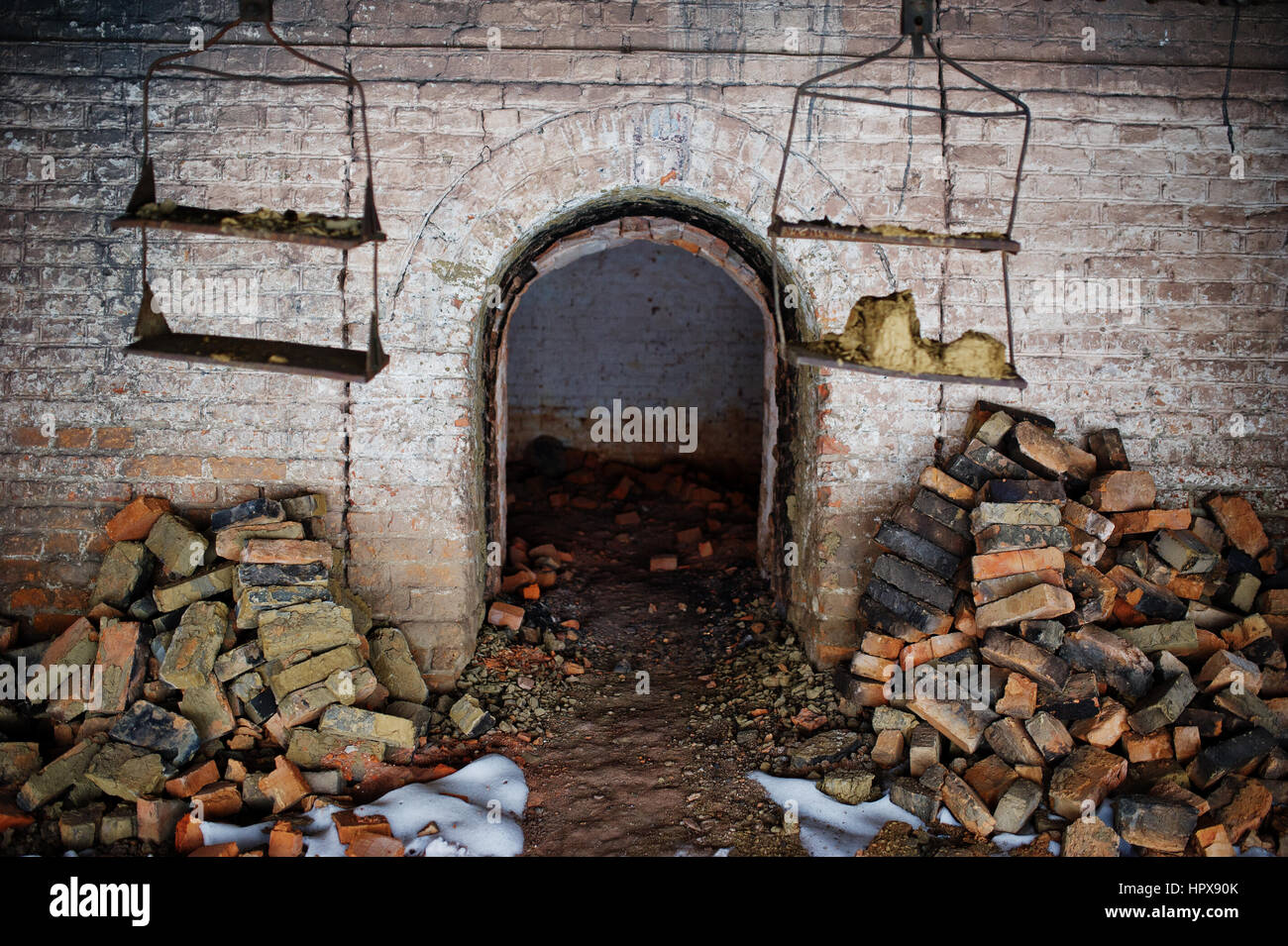 Scary brick arch tunnel on dark and some light Stock Photo - Alamy