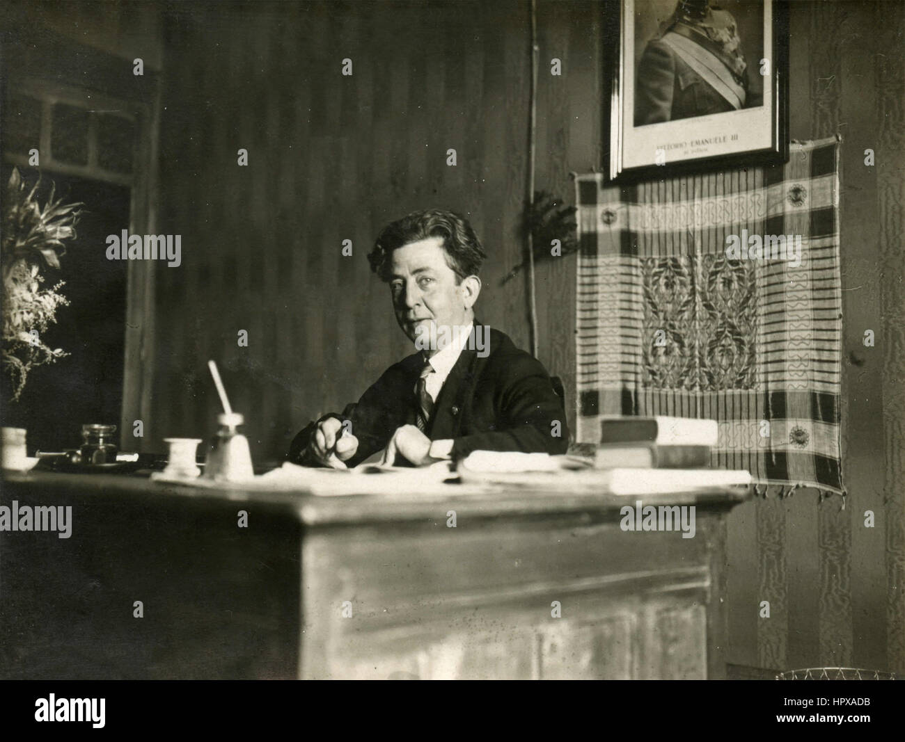 A man at his desk, Italy Stock Photo - Alamy