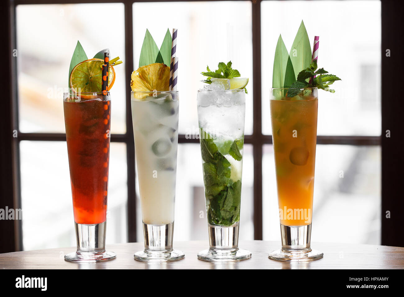 set of cocktails and soft drinks on the wooden table Stock Photo - Alamy