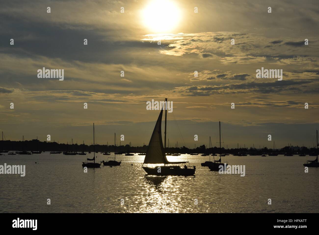 Sunset at the docks Stock Photo - Alamy