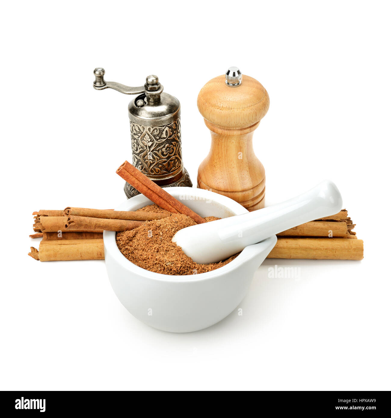 cinnamon, mill and mortar Grinder isolated on white background Stock ...