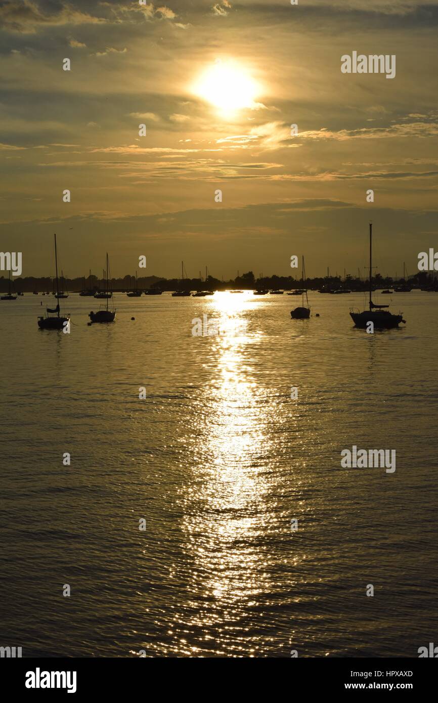 Sunset at the docks Stock Photo - Alamy