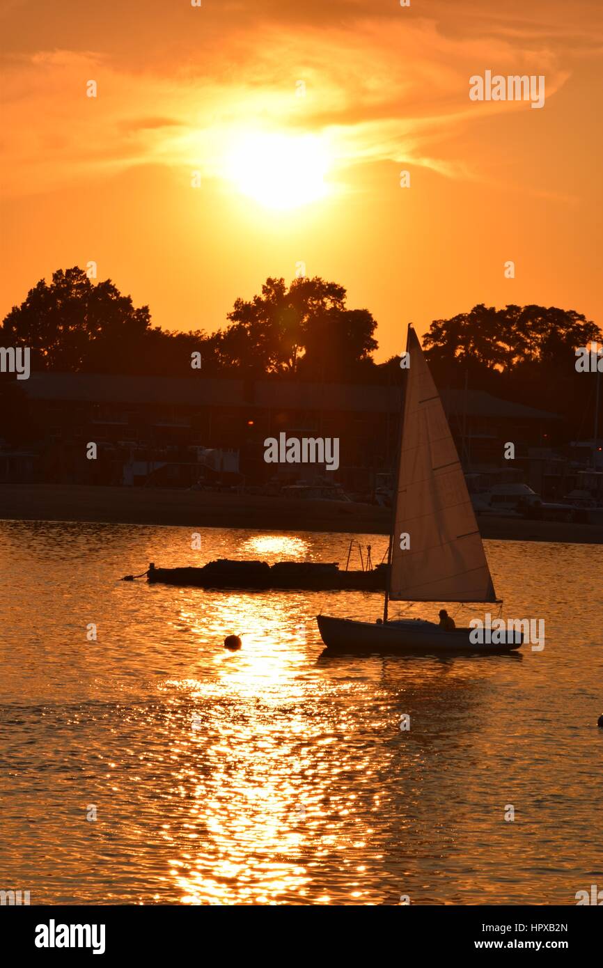 Sunset at the docks Stock Photo - Alamy
