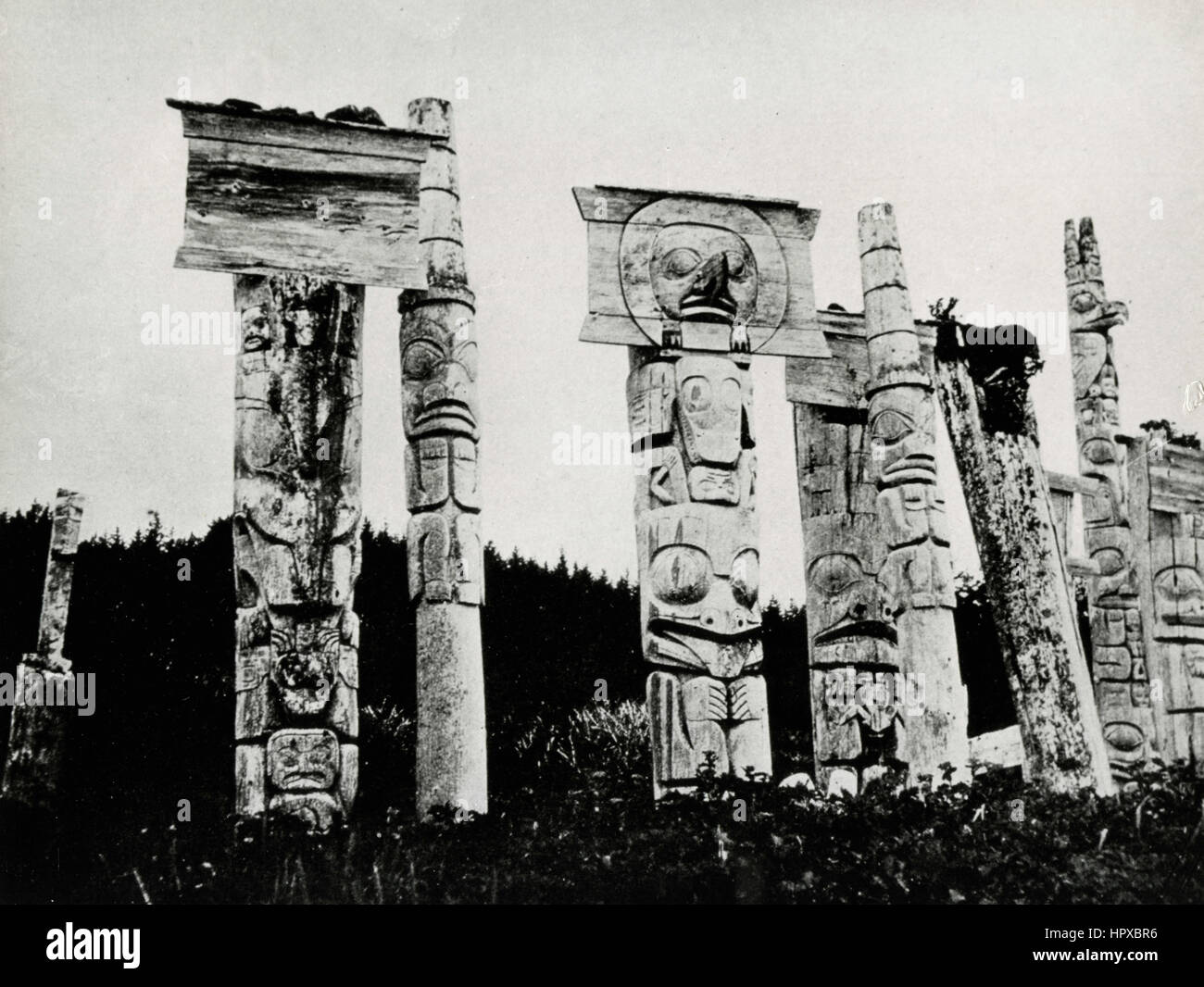 Haida Gwaii memorial Totem poles, Anthony Island, Canada Stock Photo ...